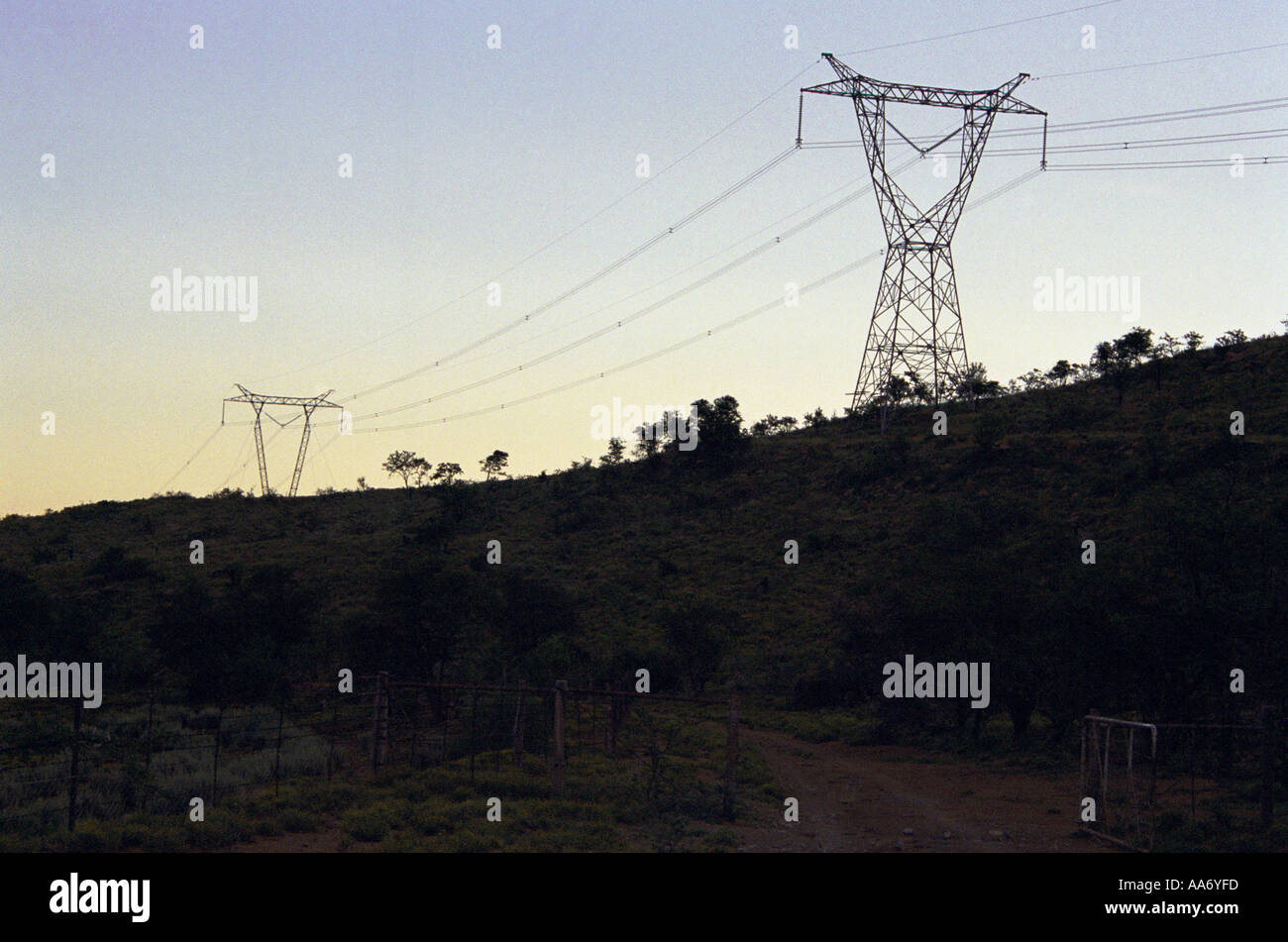 A silhouette of an electricity pilon on a farm near Bedford in the ...