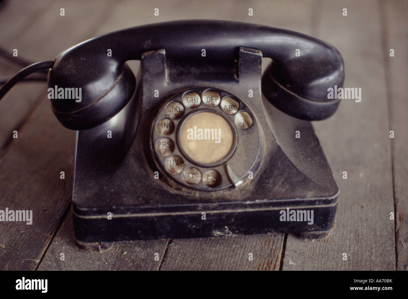 Photo of and old dusty rotary dial bakelite phone Stock Photo - Alamy