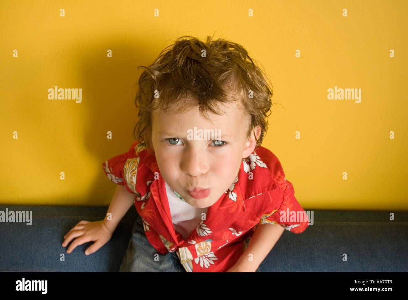 Child looking cheeky Stock Photo - Alamy
