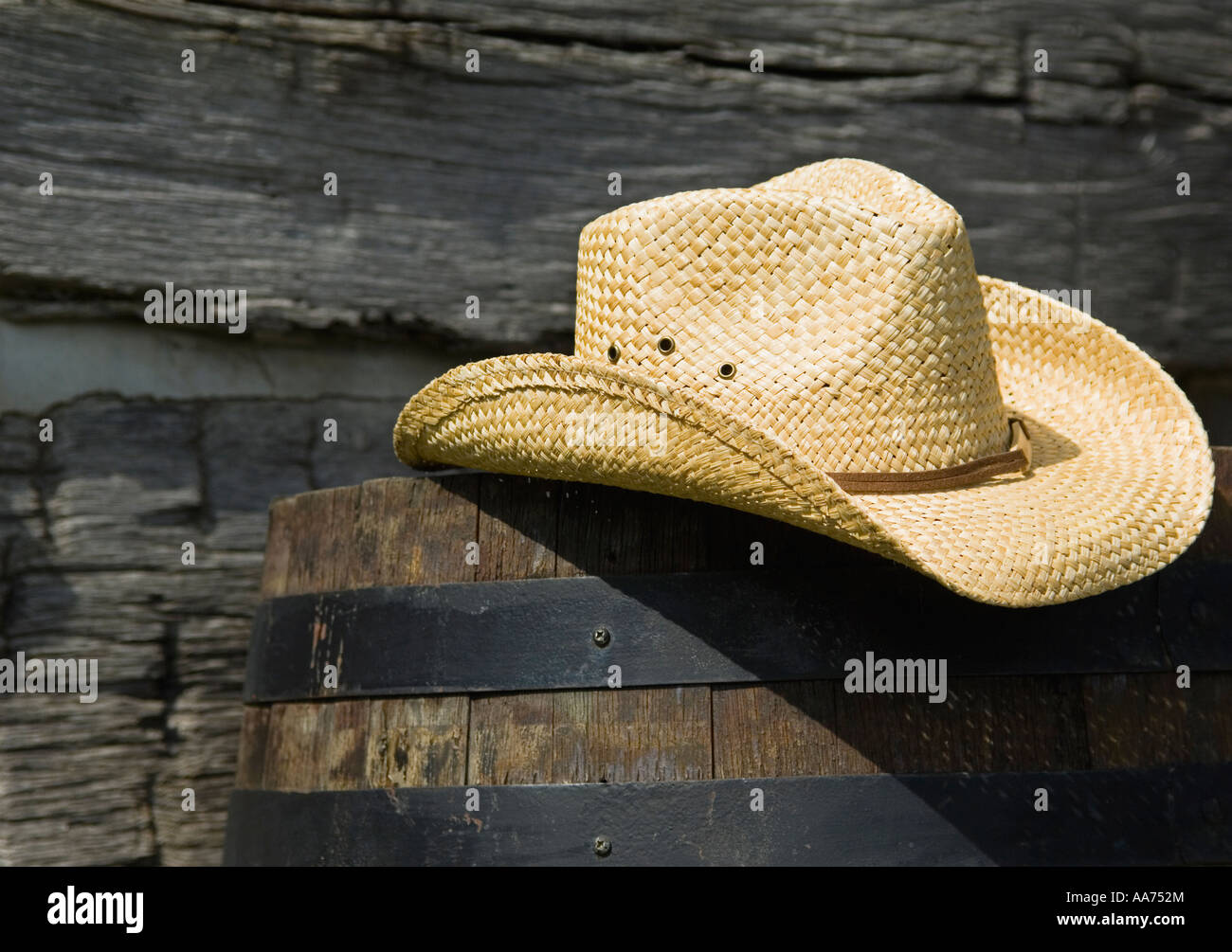 Cowboy hat on barrel Stock Photo - Alamy