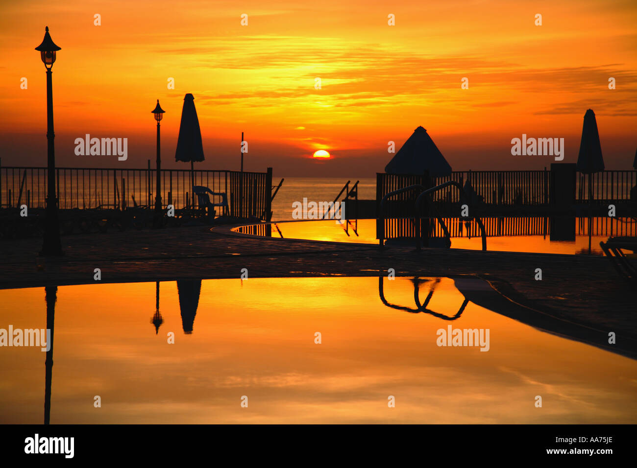 Sunset over Swimming Pool 3 Stock Photo - Alamy
