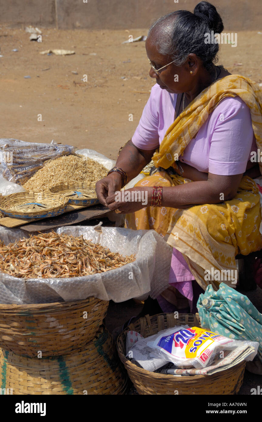 Old lady selling fresh fish hi-res stock photography and images - Alamy