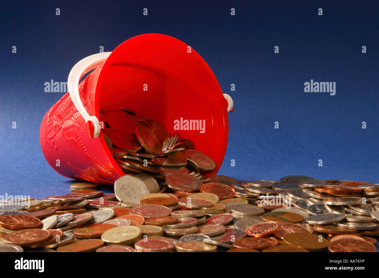 A bucketful of cash Stock Photo - Alamy
