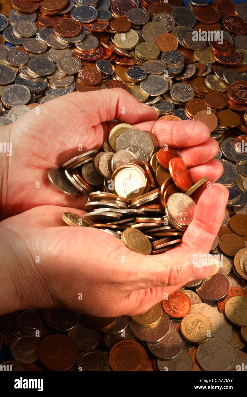 Handfuls of cash Stock Photo - Alamy