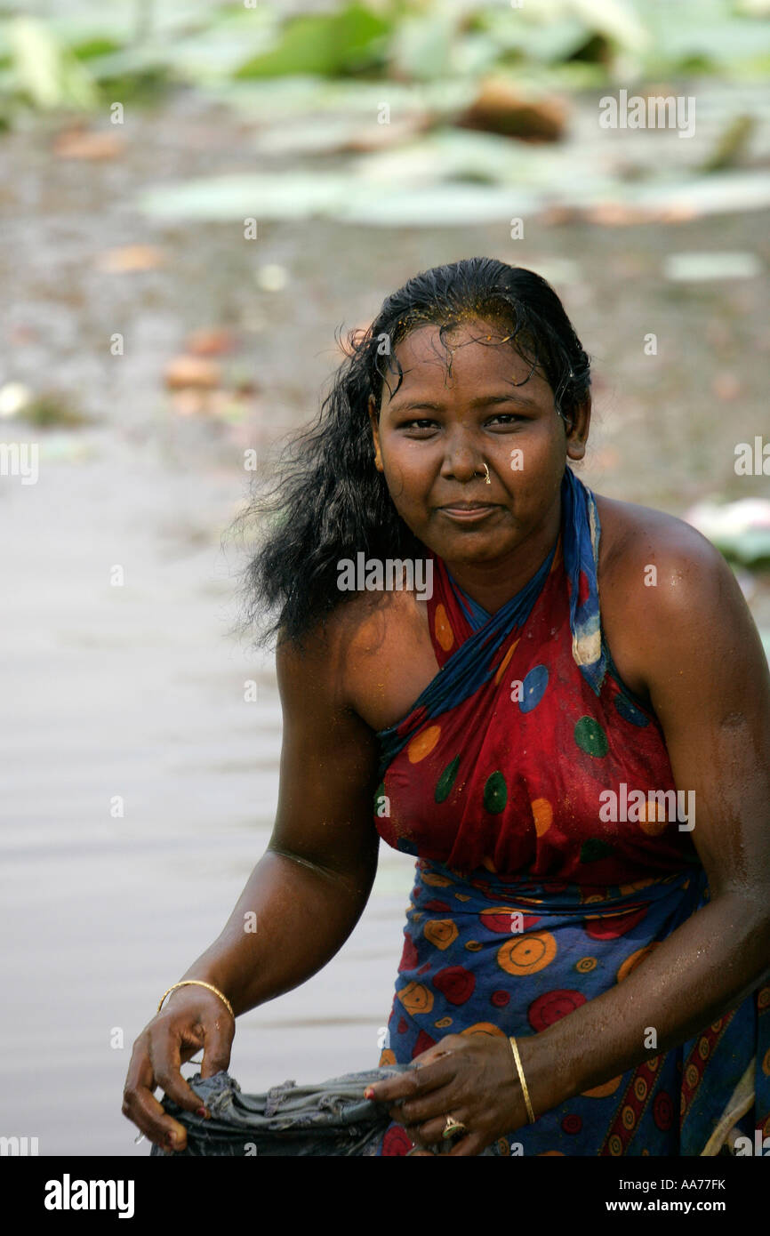 Village Women Bathing In Pond