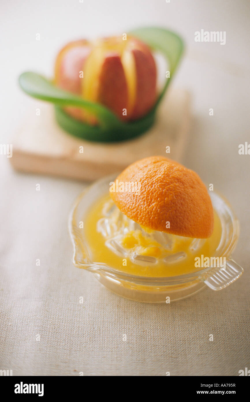Fruit juicer and orange Stock Photo - Alamy
