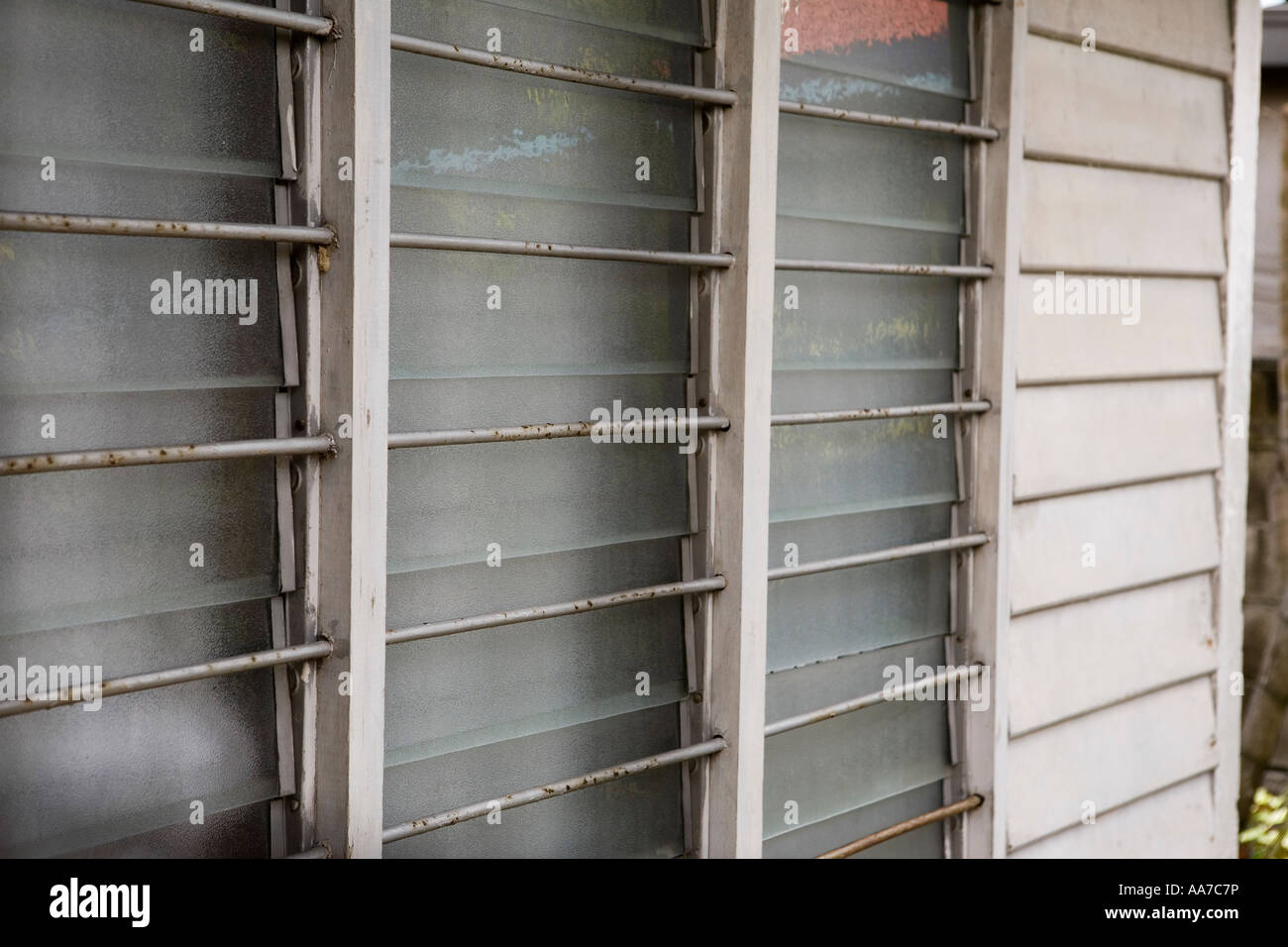 Louvred windows of a wooden house at Pulau Ketam Stock Photo - Alamy