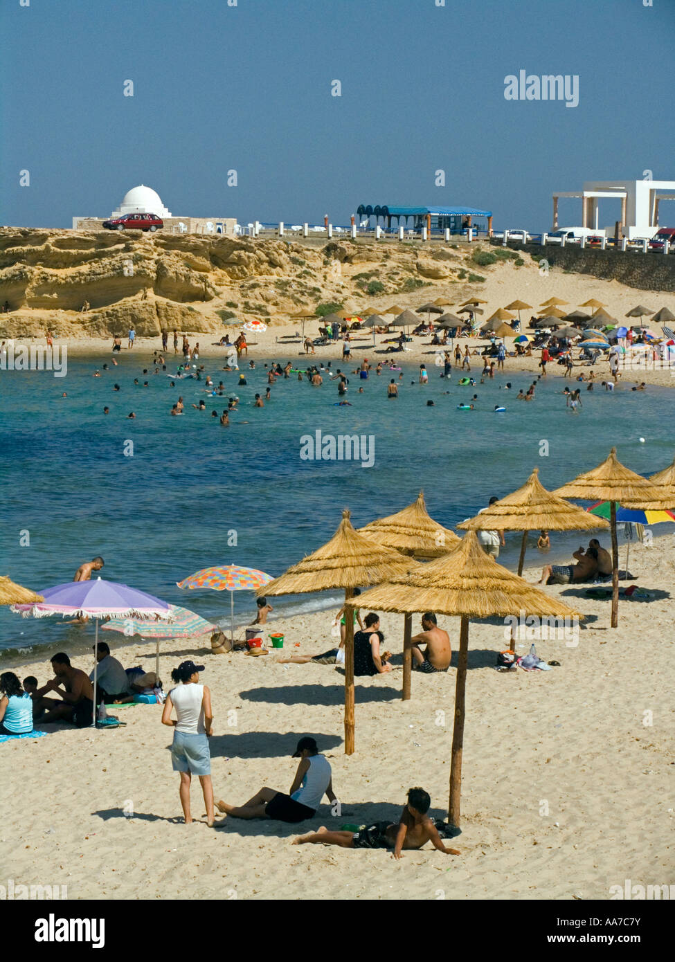 Thatch sunshades Monastir Beach Tunisia Stock Photo - Alamy