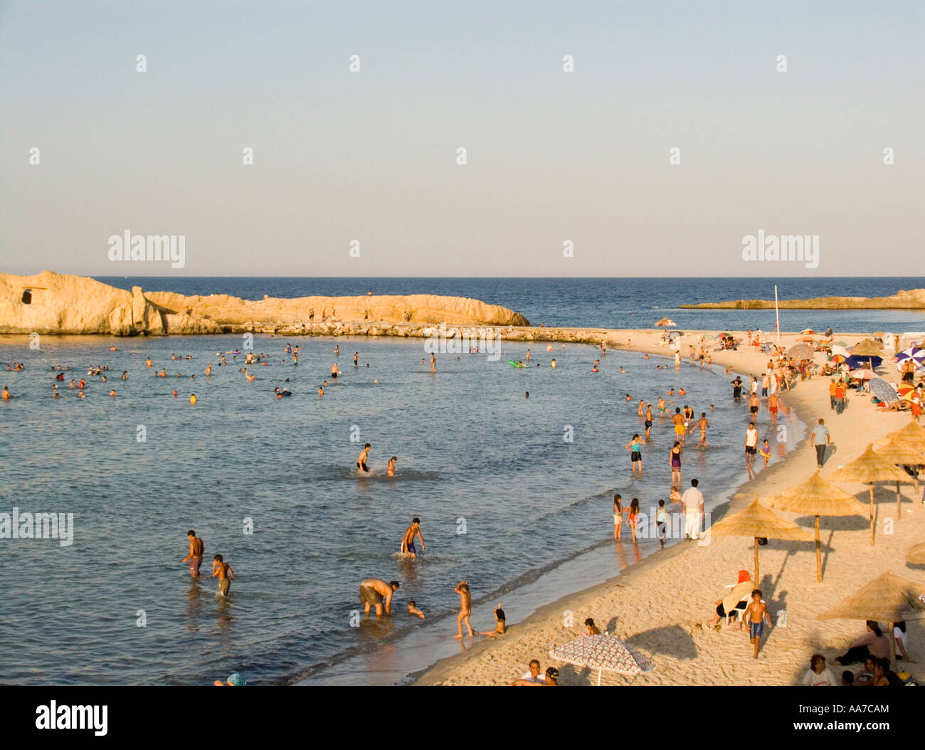 Holidaymakers cool off Monastir Beach Tunisia Stock Photo - Alamy