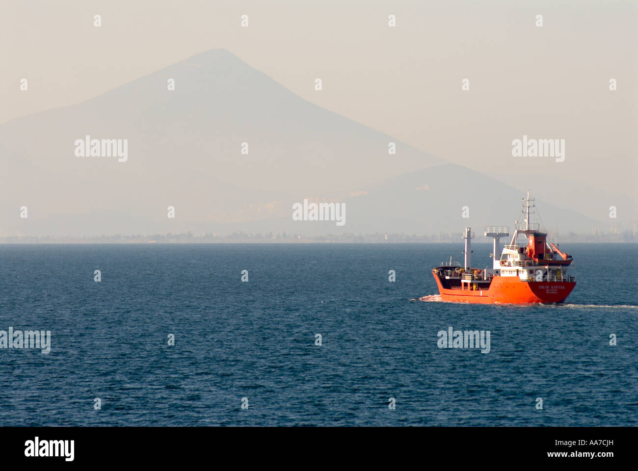 Tanker and Island Stock Photo - Alamy