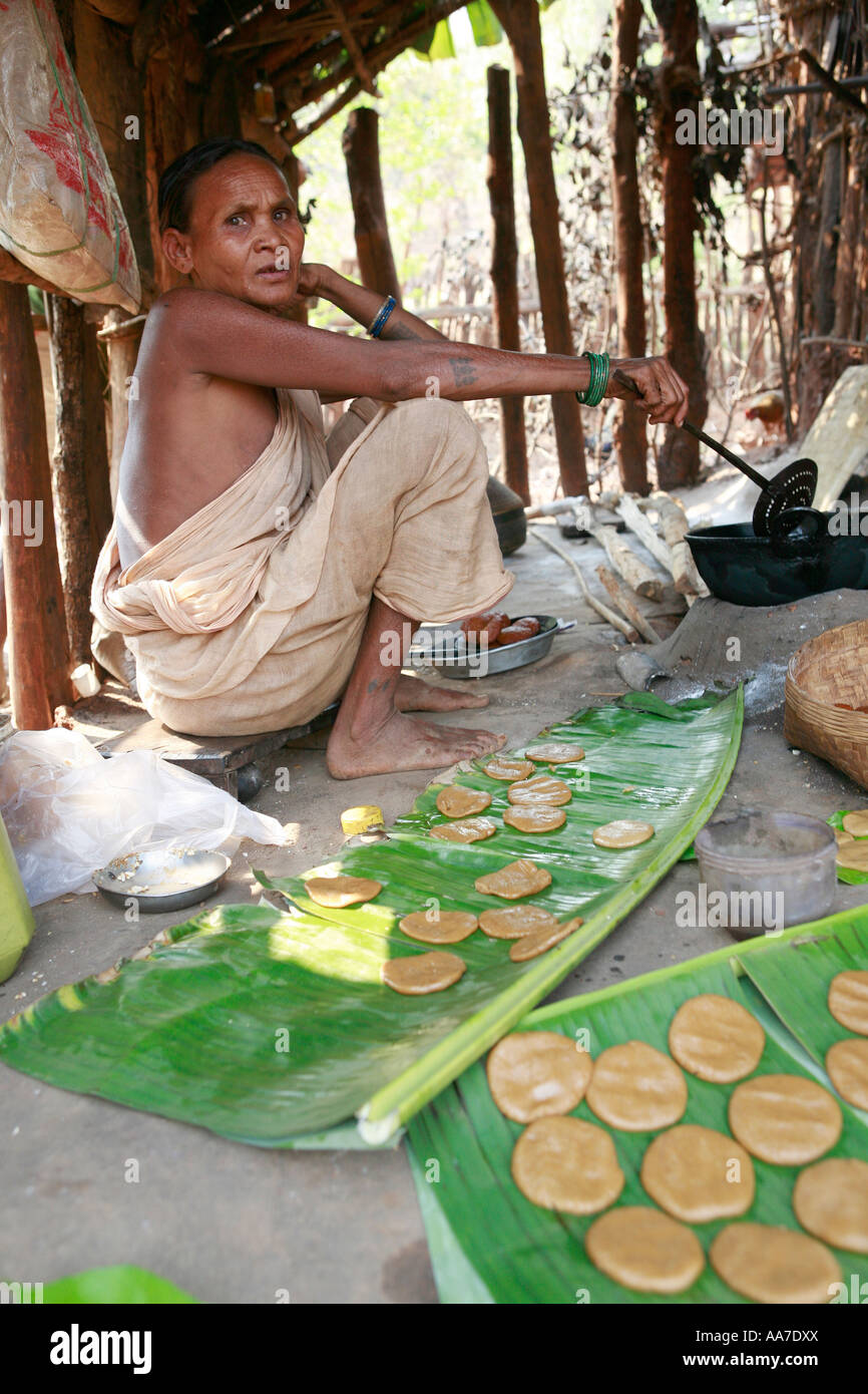 Cooking confectionery at a village near Baliguda, Orissa, India Stock ...