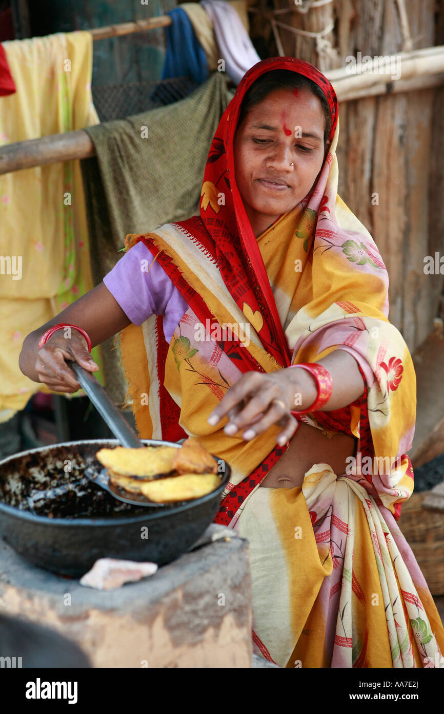 Woman cooking at the market at Kotgarh, Orissa, India Stock Photo - Alamy