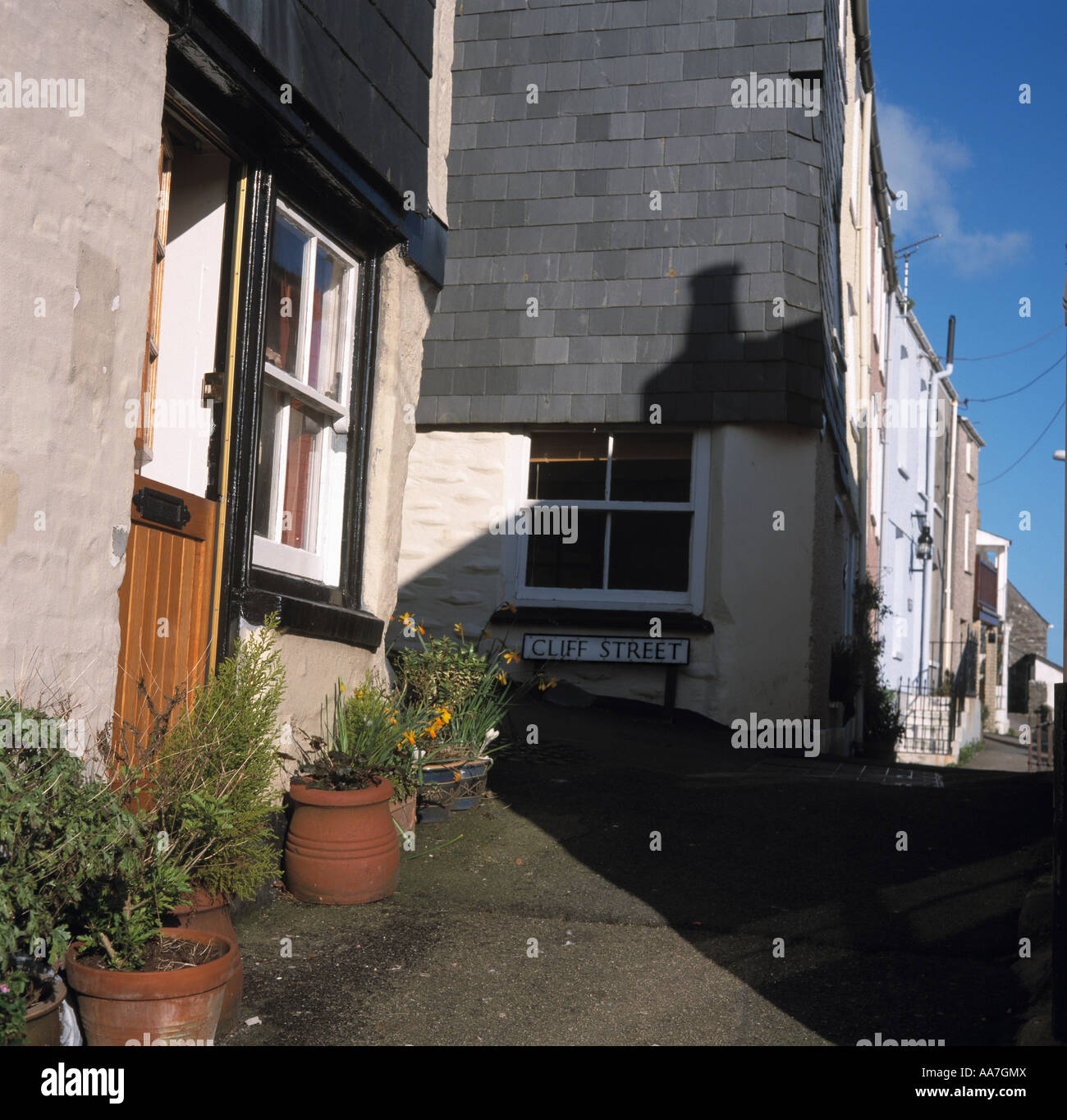 Picture shows the entrance to Cliff Street a road with steep incline ...