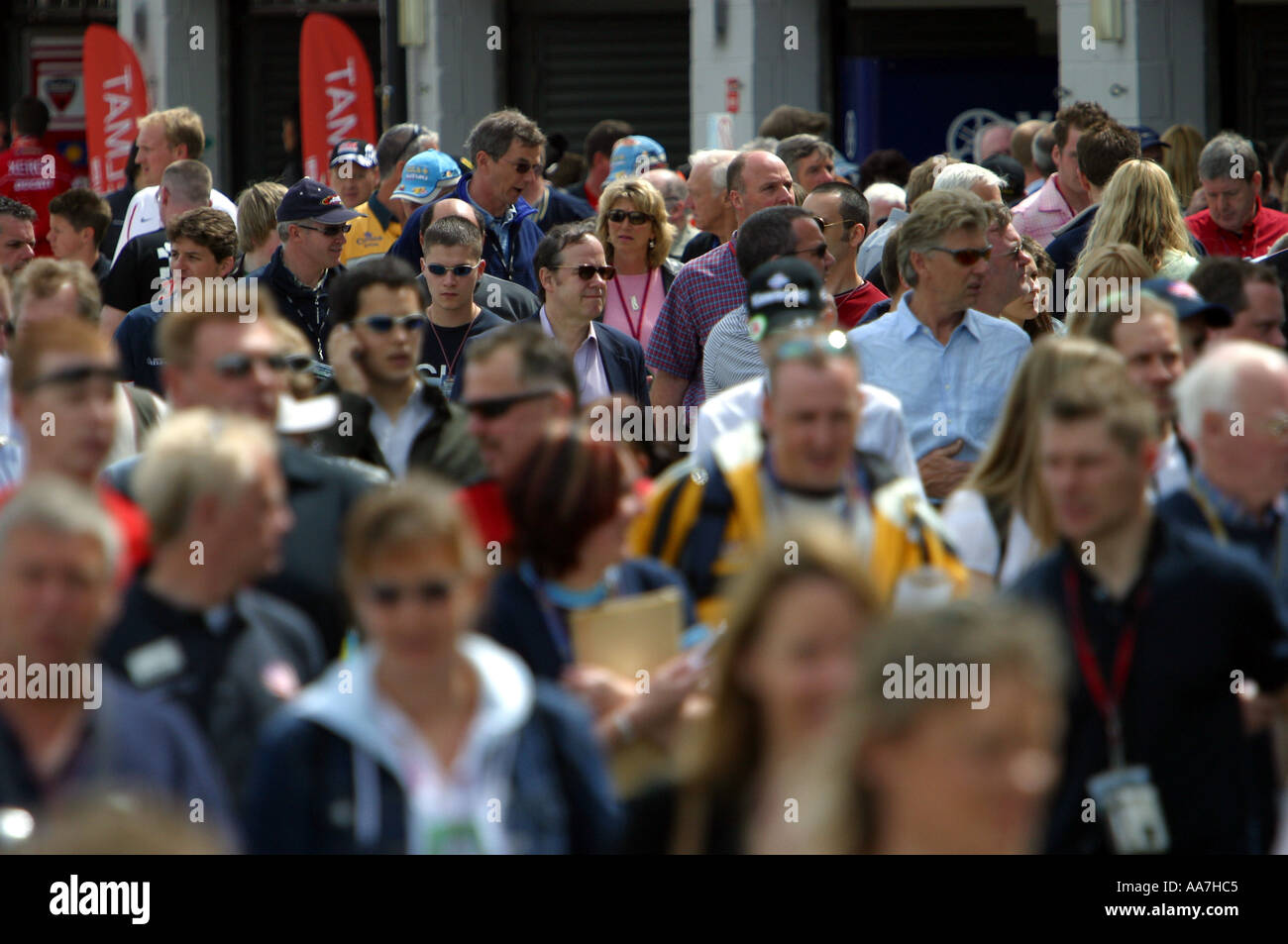 spectators at a motorsports event walking in pitlane Stock Photo - Alamy