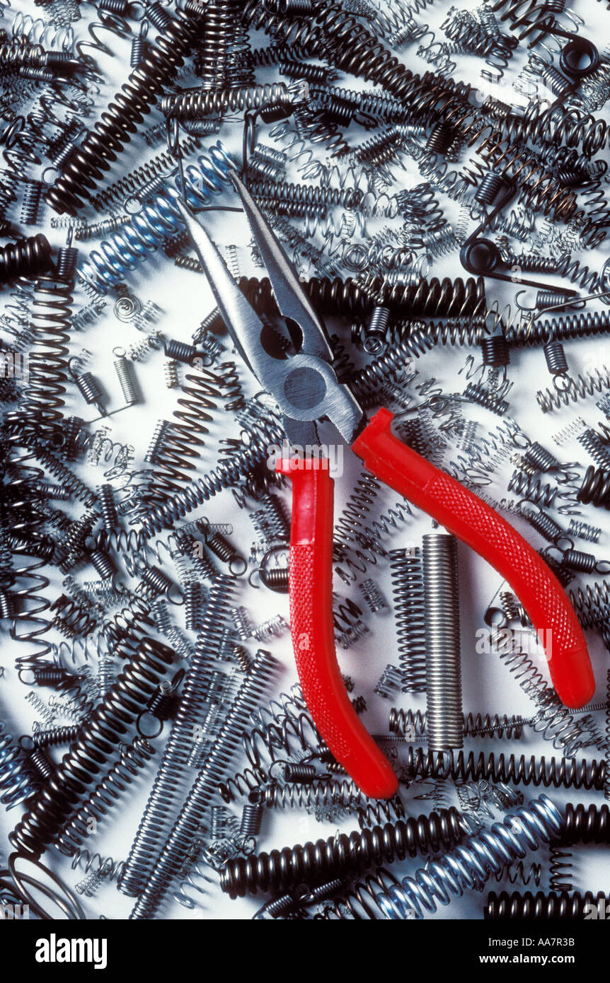 Pile metal springs hi-res stock photography and images - Alamy