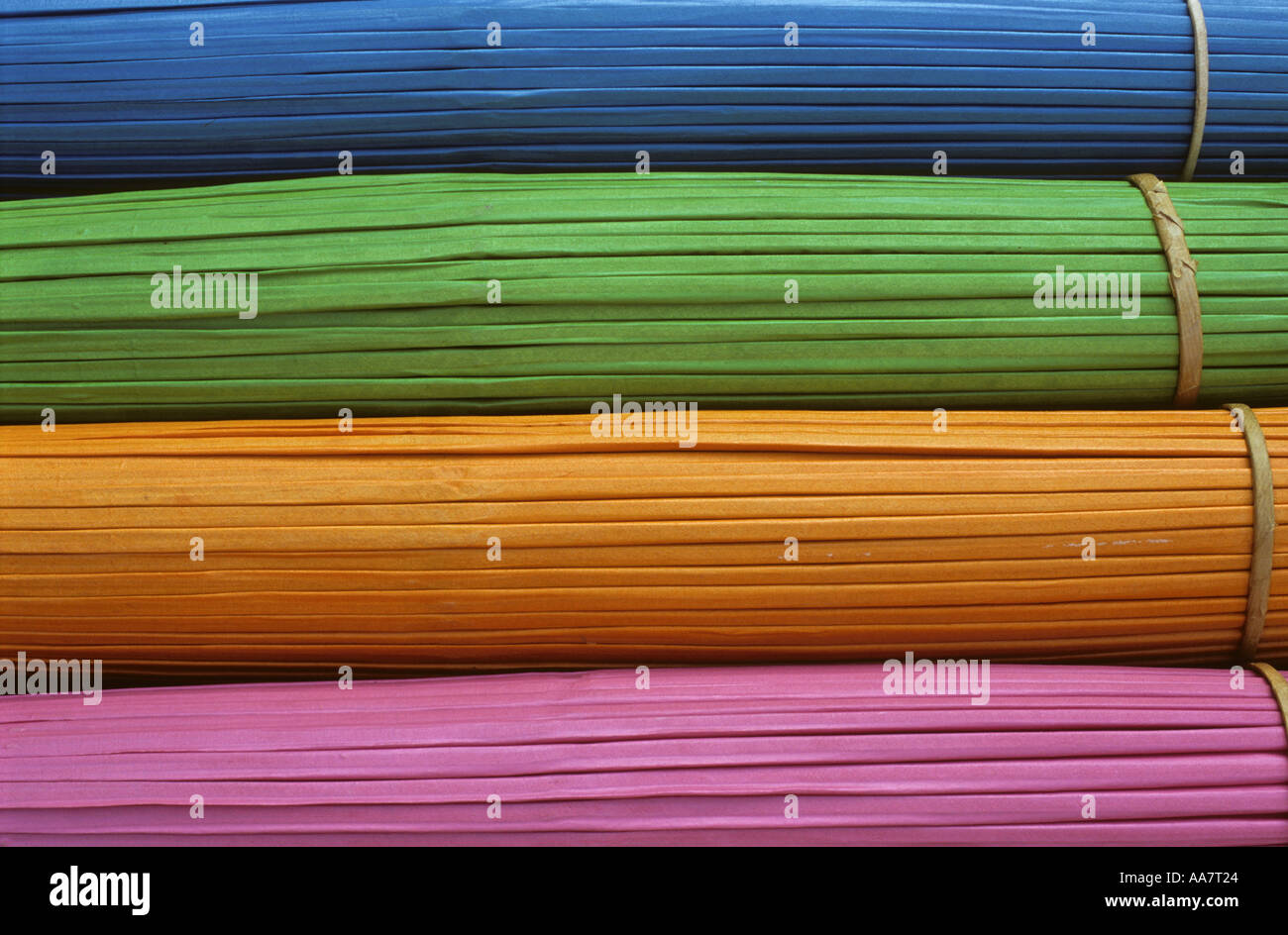 rolled up painted umbrellas Stock Photo - Alamy