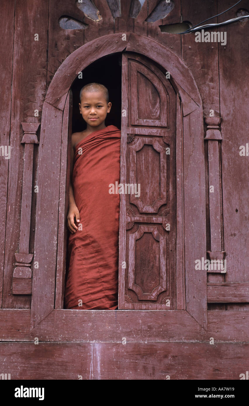 Novice monk by door of temple hi-res stock photography and images - Alamy