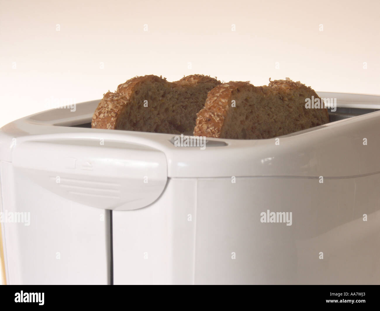 Bread in a toaster Stock Photo - Alamy
