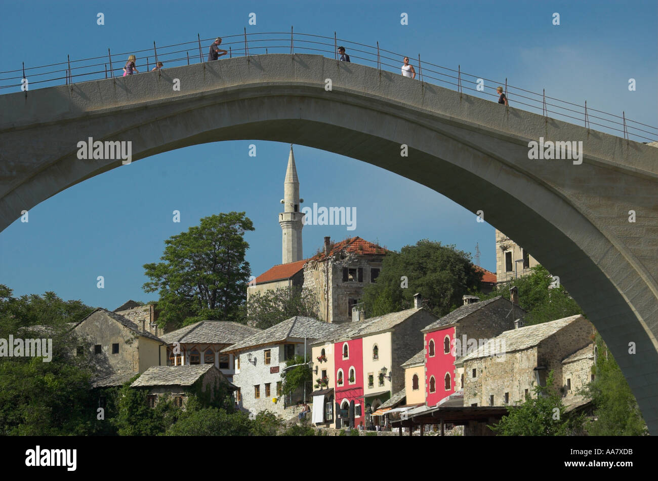 Bosnia Neretva river Mostar close up of bidge with painted houses and ...