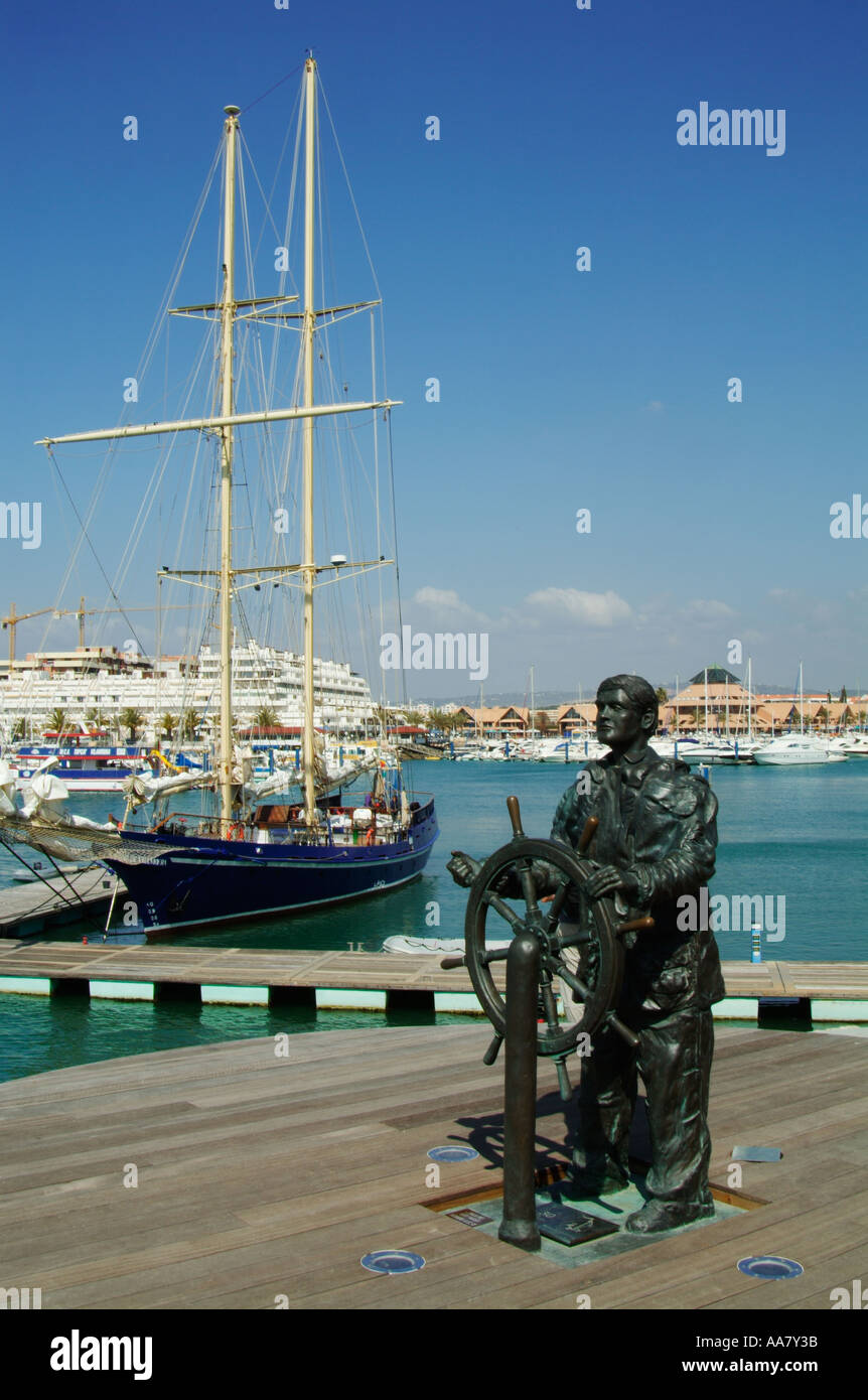 Statue of Silva da Ponte the navigator at Vilamoura marina complex ...