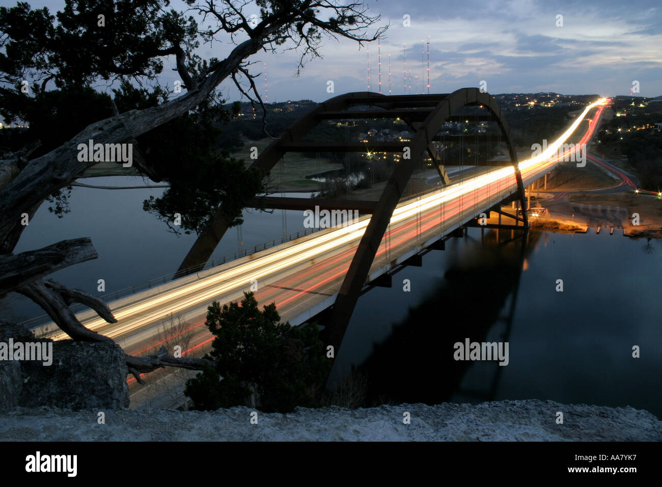Cars zoom across the 360 bridge (Pennybacker Bridge) in Austin, Texas ...
