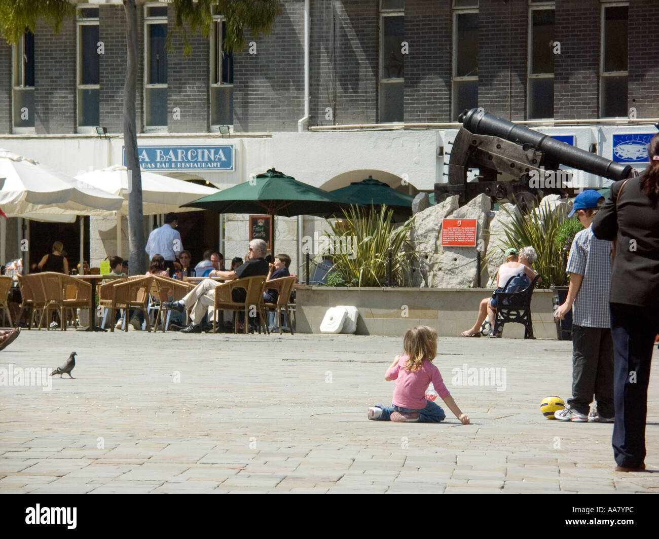 Little girl sitting on the ground, Casemates Square, Gibraltar child ...