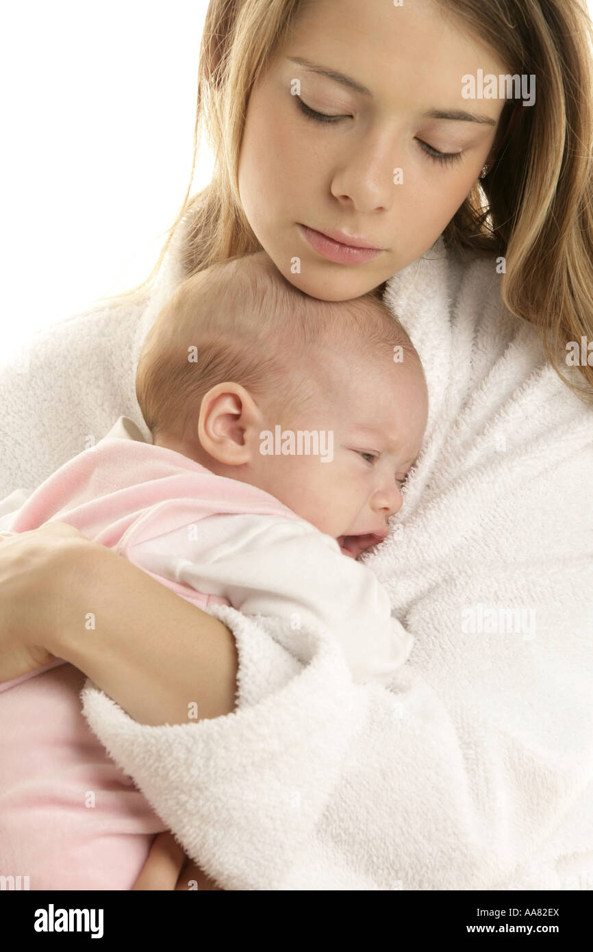 Mother with crying baby Stock Photo - Alamy