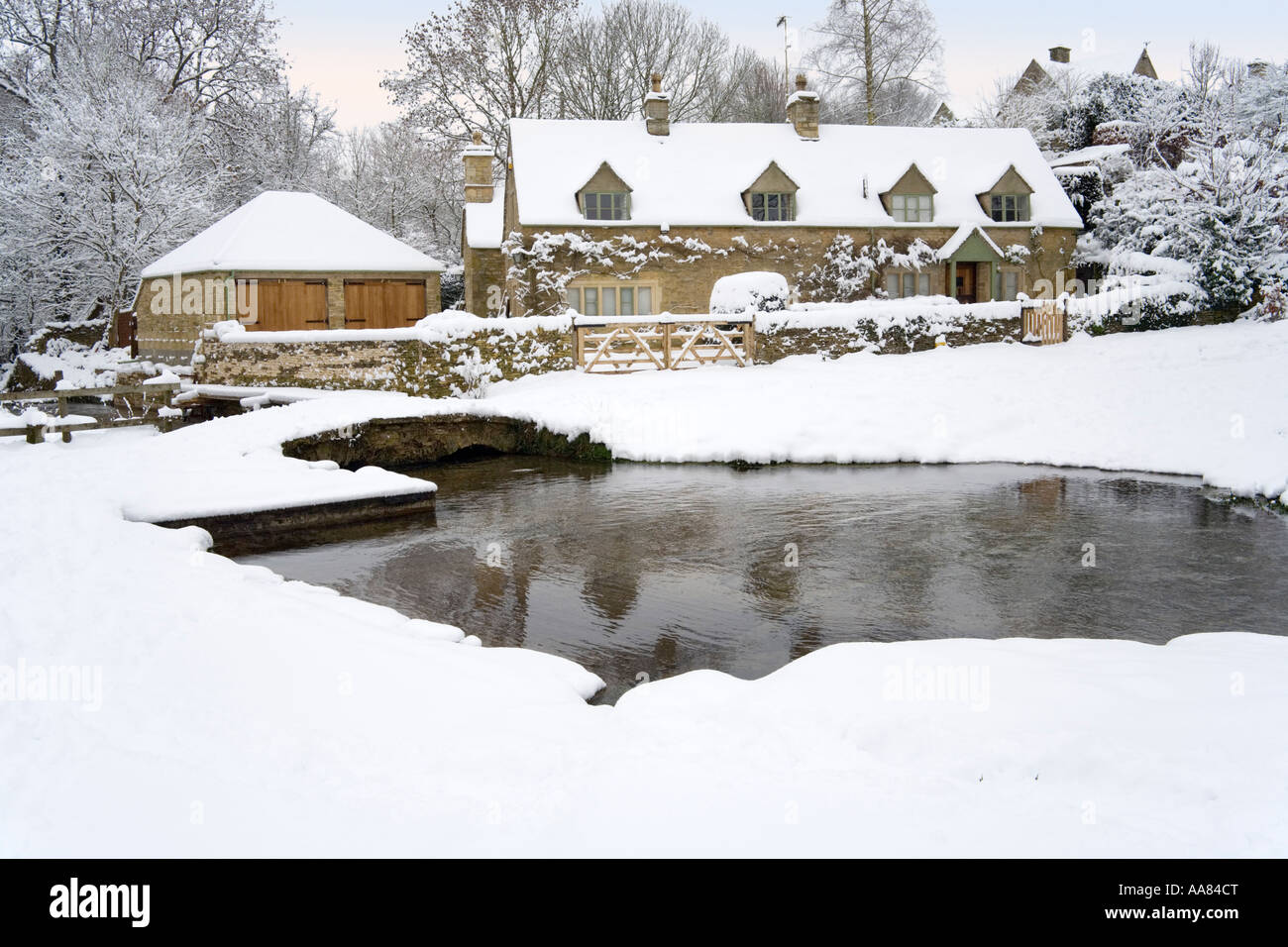 Winter snow in the Cotswold village of Upper Slaughter Gloucestershire ...