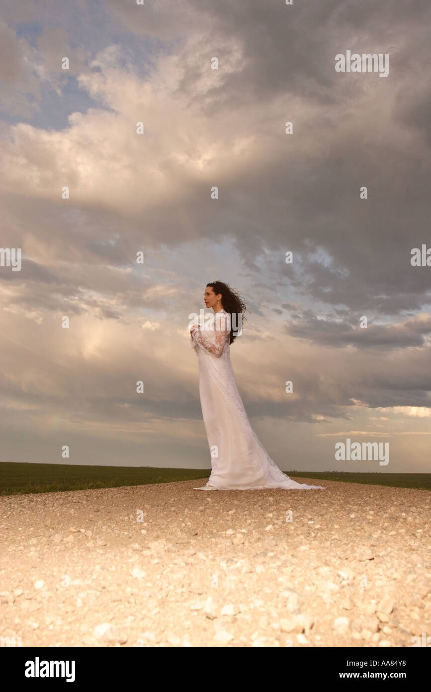 Lovely bride background by fluffy cumulus clouds in scenic Saskatchewan ...