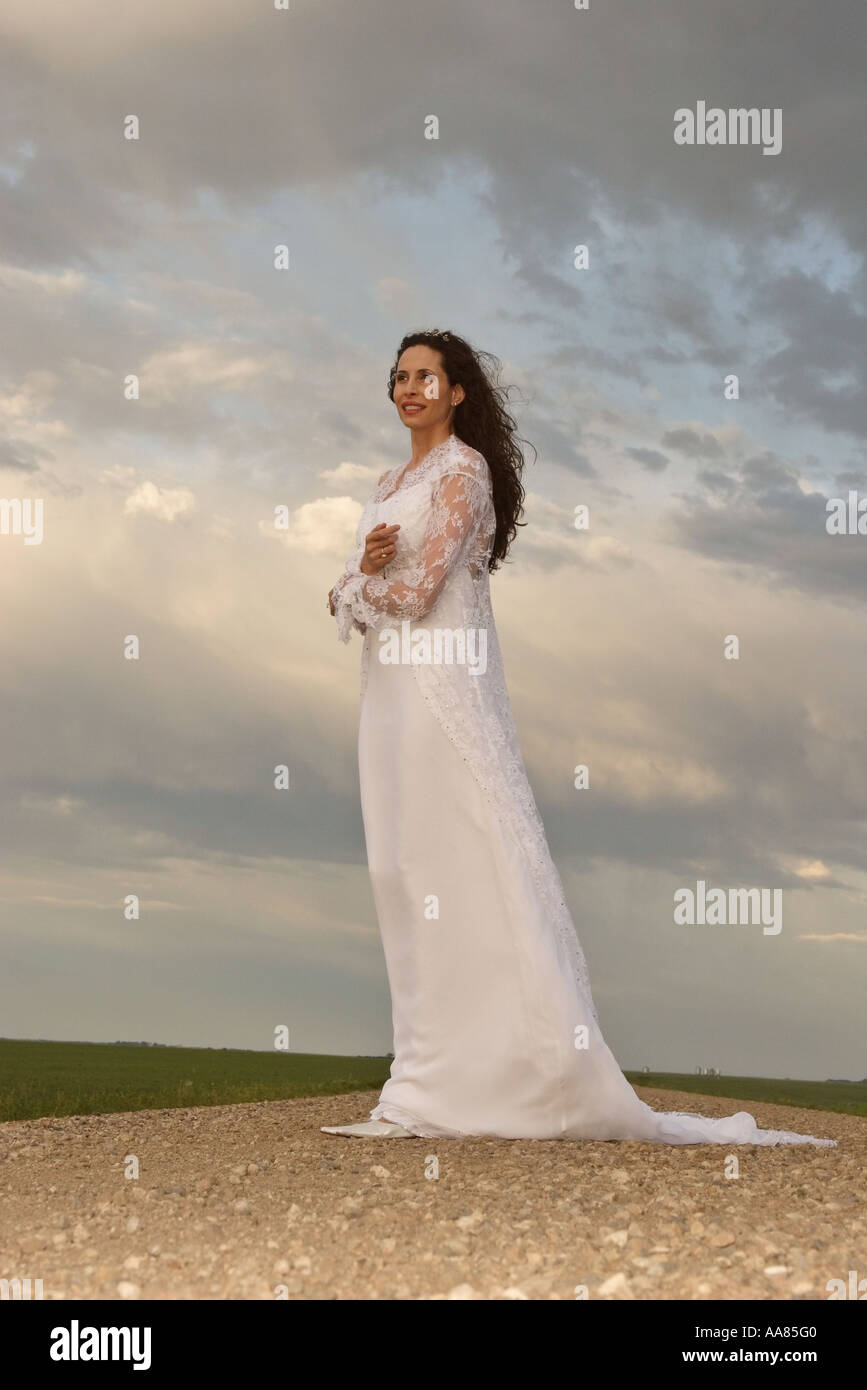 Lovely bride background by fluffy cumulus clouds in scenic Saskatchewan ...