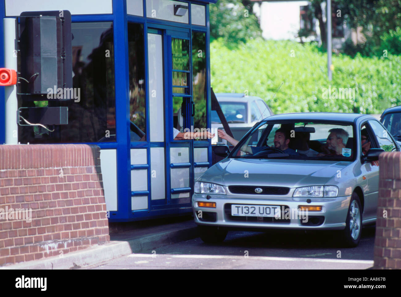 Subaru using toll booth on Itchen bridge Southampton Stock Photo - Alamy