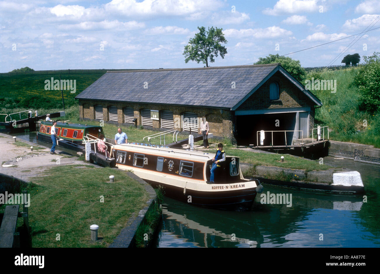 Narrowboats at Bulbourne lock and dry dock on the Grand Union Canal in ...