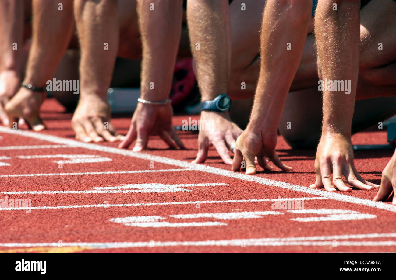 Hands of female athletes ready to start Stock Photo - Alamy
