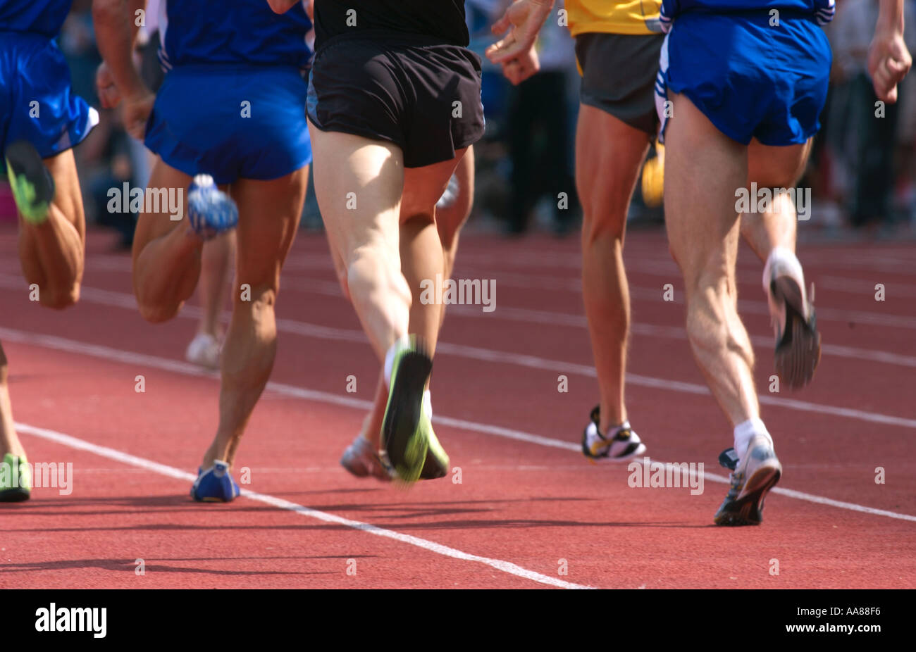 Legs of running athlets Stock Photo - Alamy