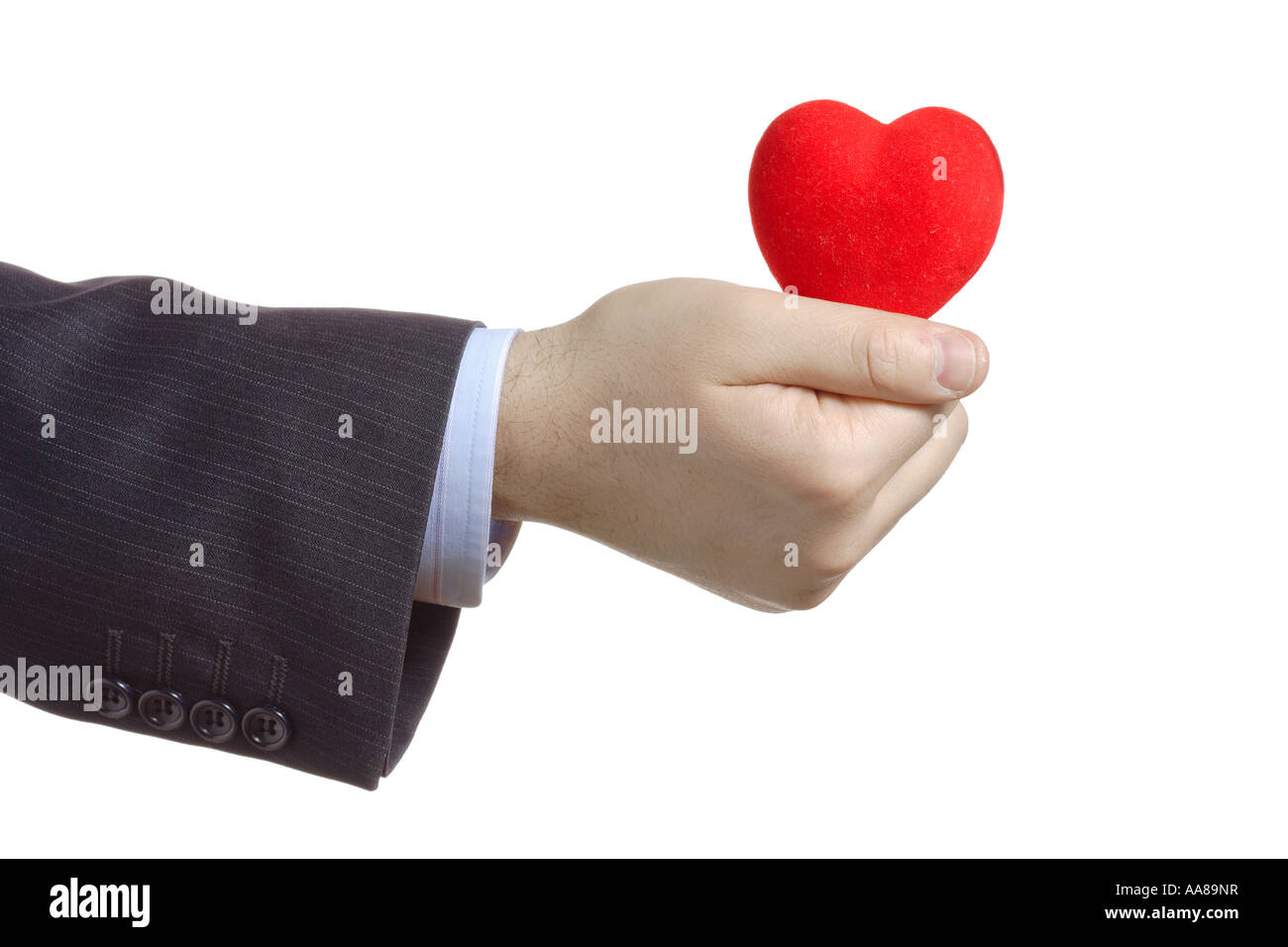 Hand holding a heart Stock Photo - Alamy