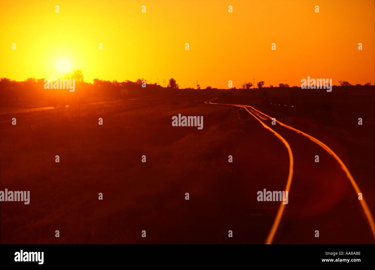 Rail lines and sunset Stock Photo - Alamy
