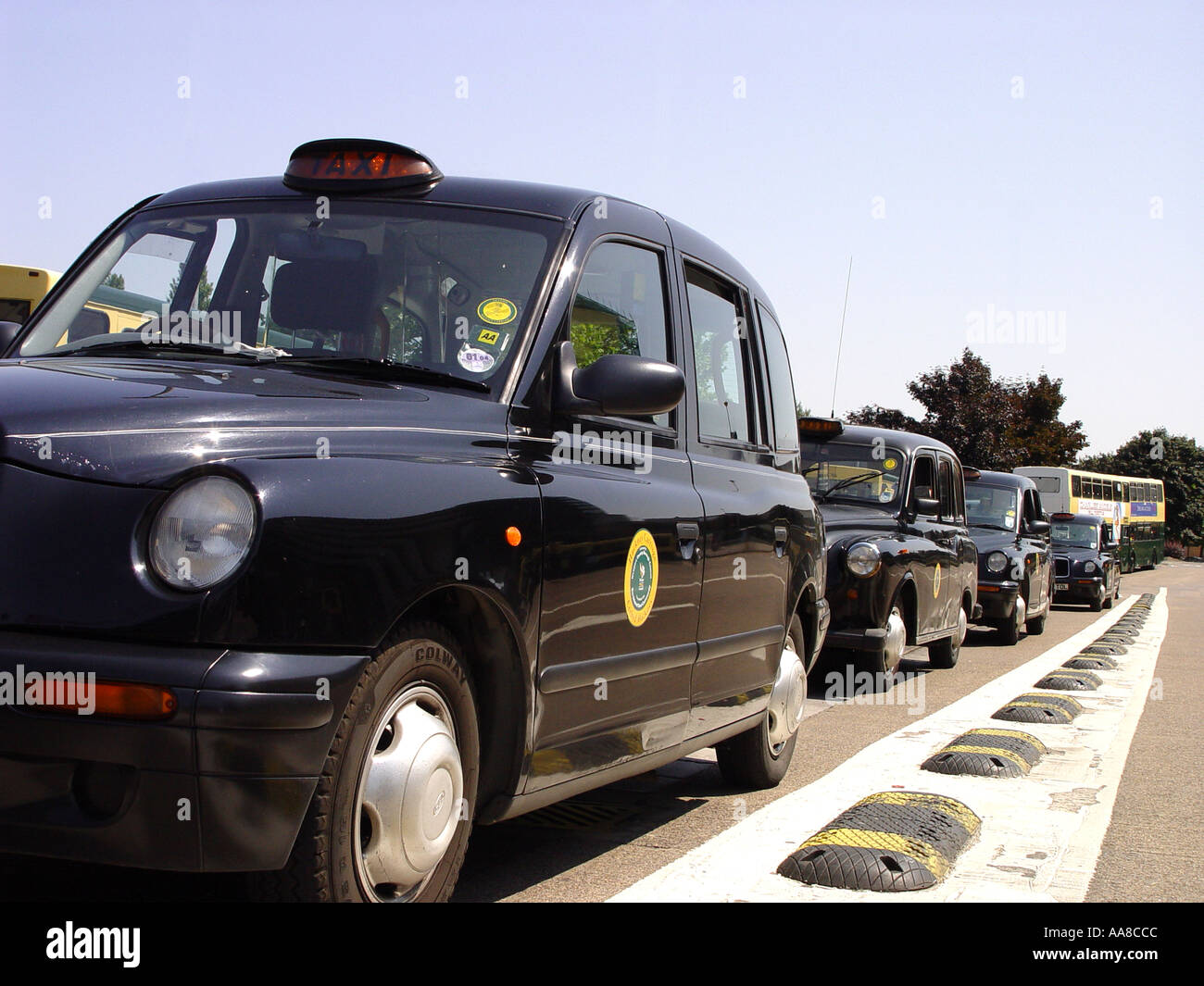 Taxi black cabs parked on a taxi rank in the city of Newport South ...
