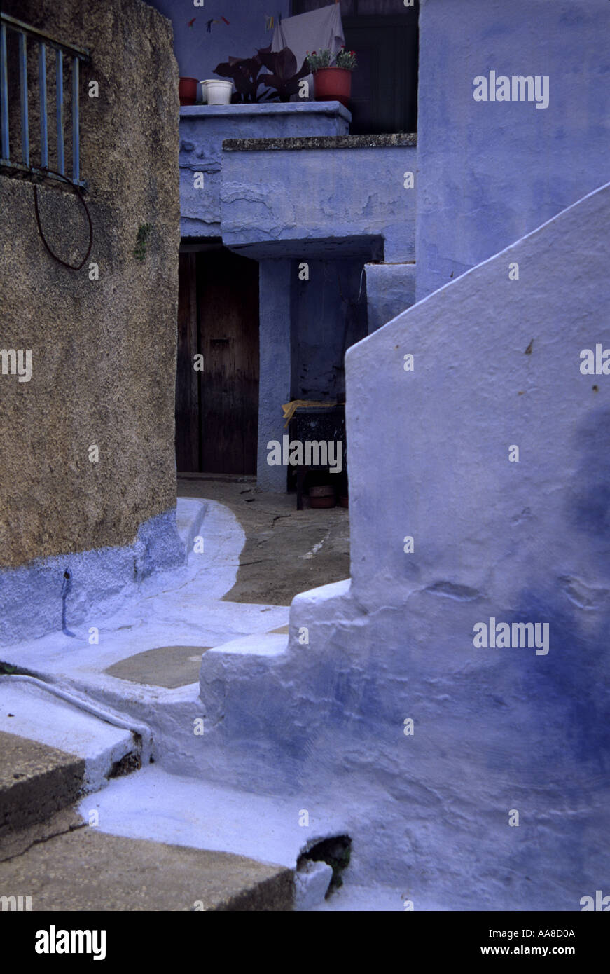Cool looking alleyway with blue washed walls in Margaritas Stock Photo ...