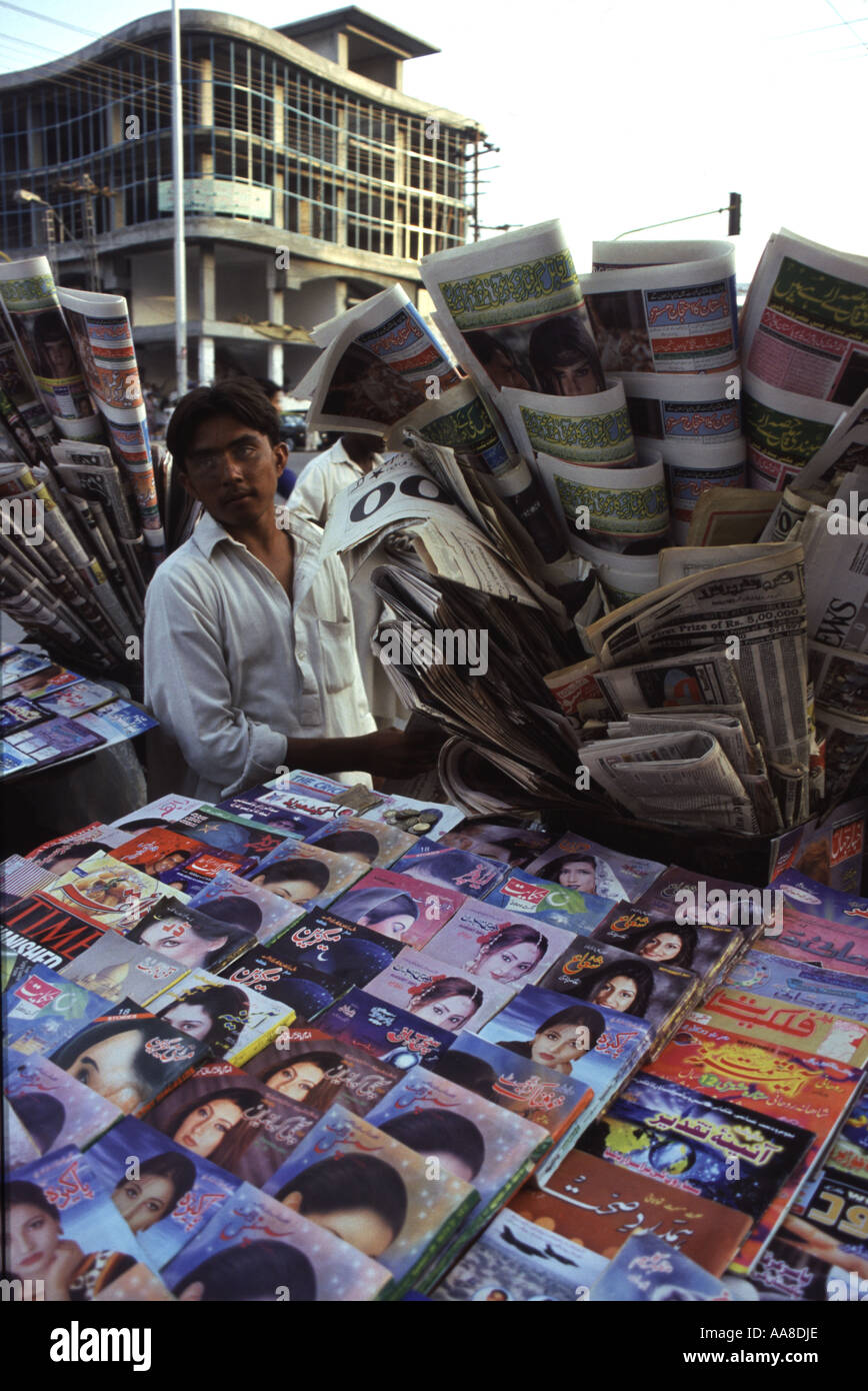 Young boy selling newspapers hi-res stock photography and images - Alamy