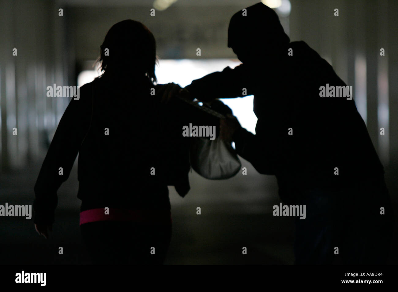 Street crime Hand bag snatch London Posed by models Stock Photo - Alamy