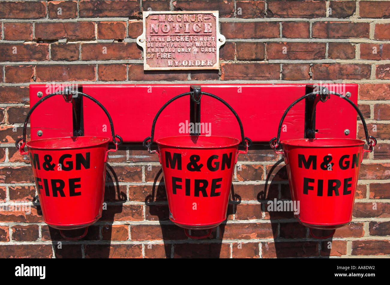 Red fire buckets and warning notice at Sheringham Station, North ...
