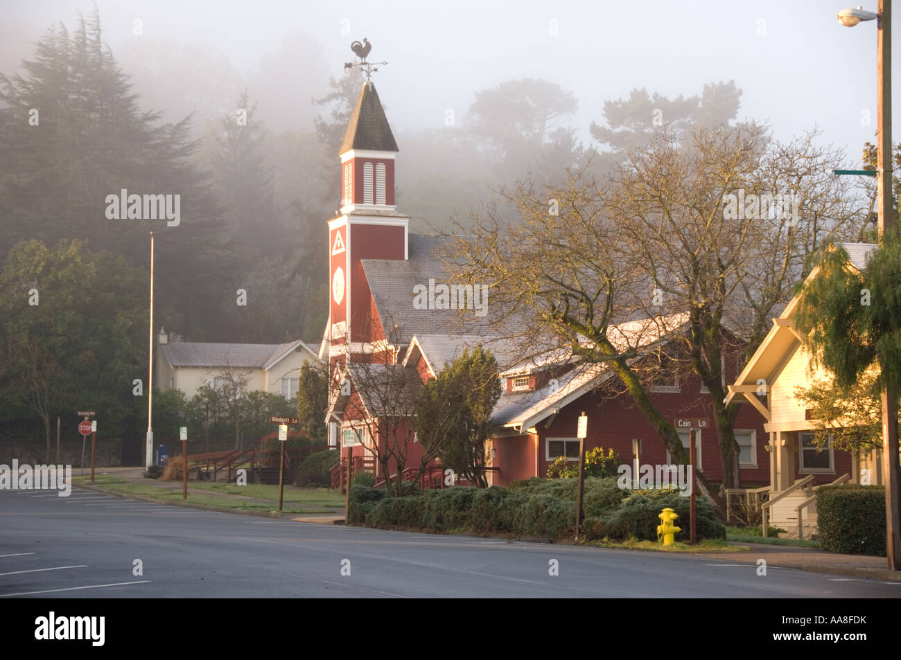 Town hall building with weather vane in a village in northern ...