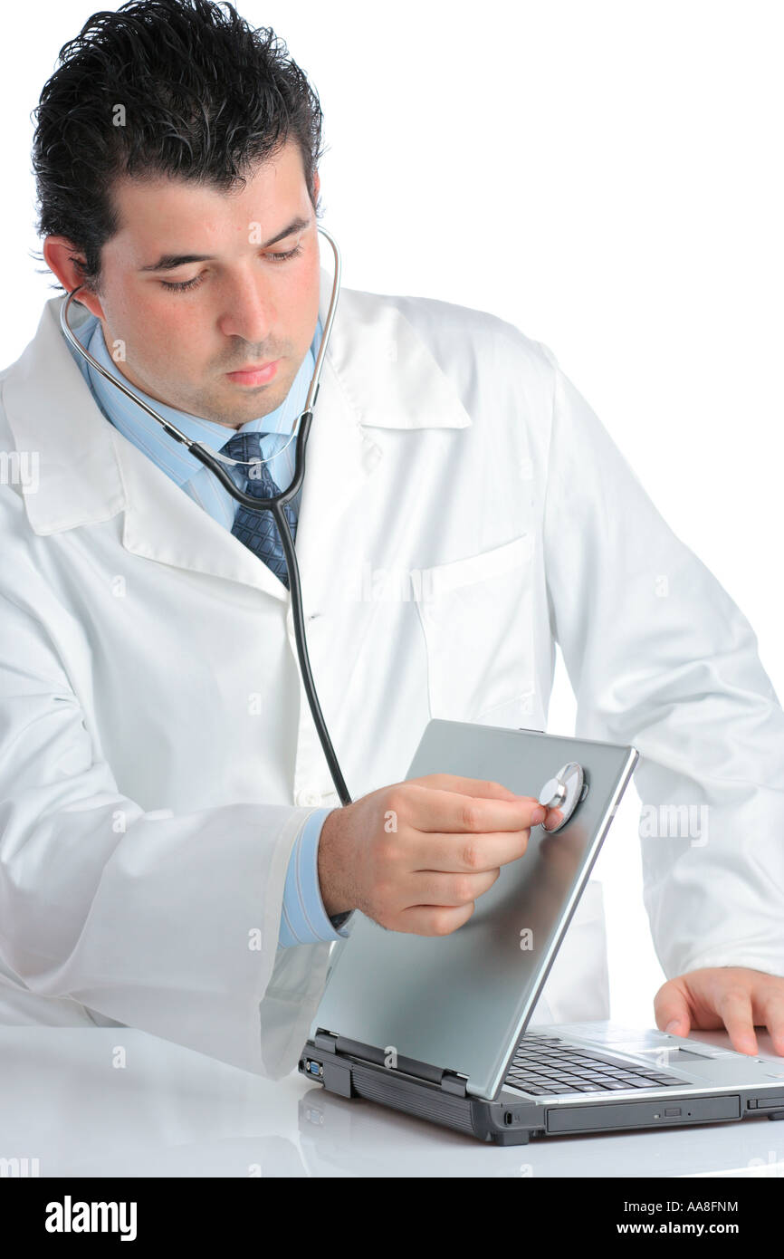 PC doctor examining a laptop computer Stock Photo - Alamy