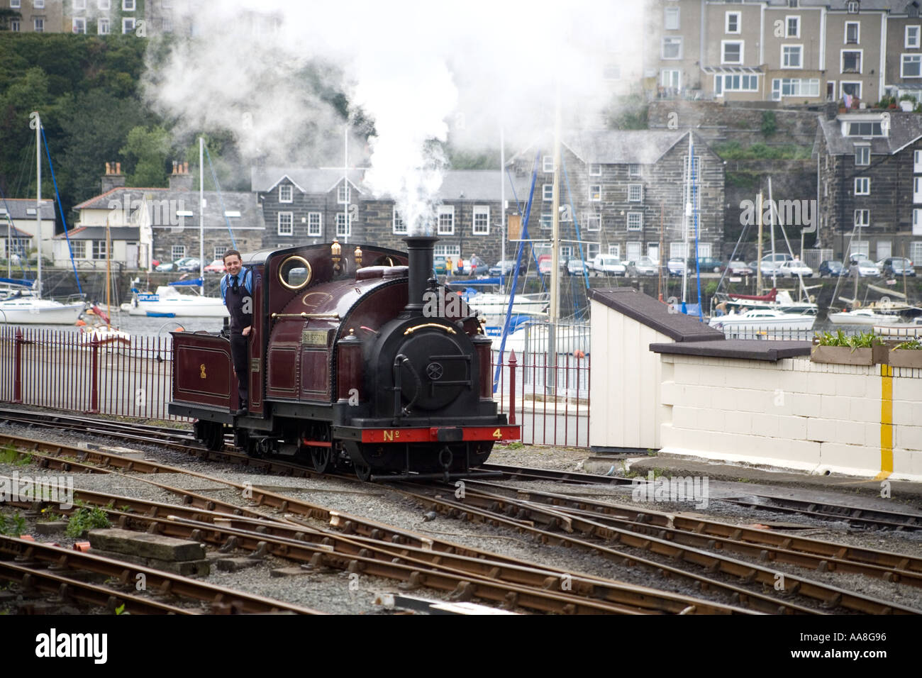 Narrow gauge steam train at Porthmadog Harbour station in North Wales ...