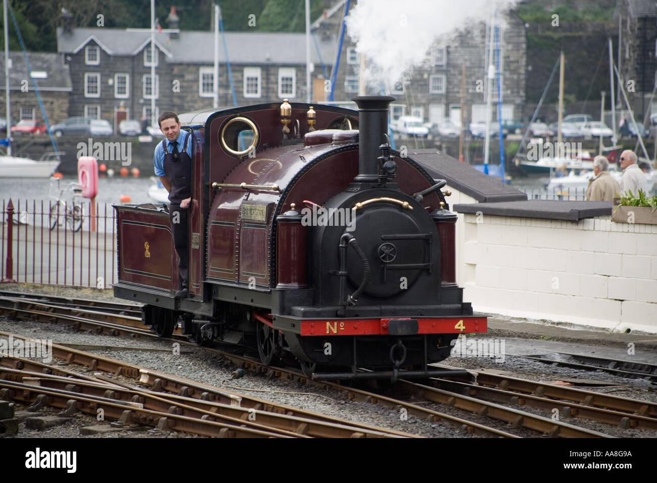Narrow gauge steam train at Porthmadog Harbour station in North Wales ...