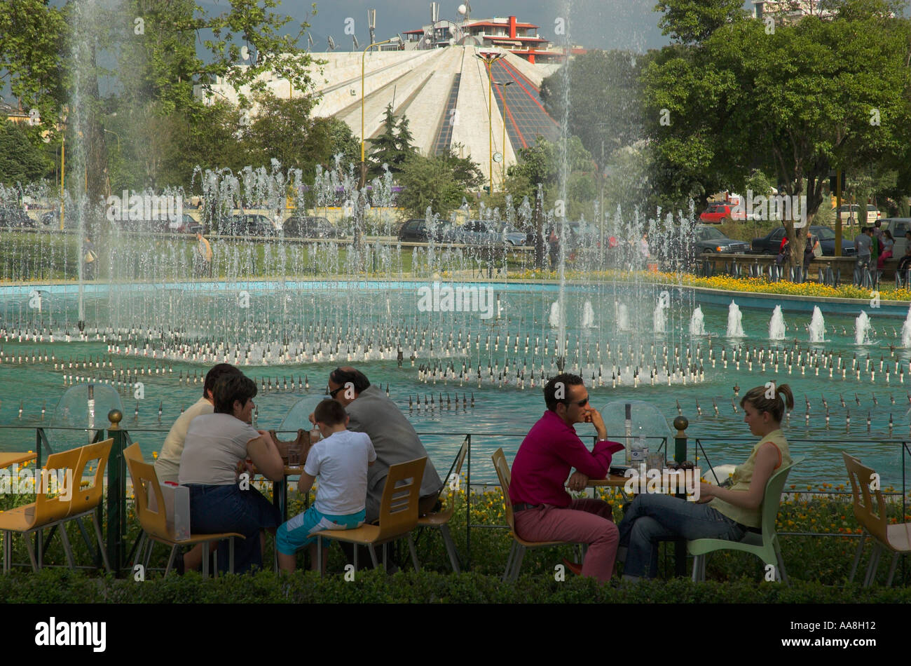 Albania Tirana Downtown Blloku cafe terrace with people and fountains ...
