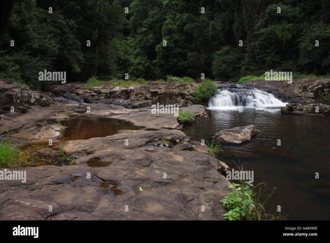 WATER FLOWING RAPIDLY DOWN A RIVER QUEENSLAND AUSTRALIA HORIZONTAL ...