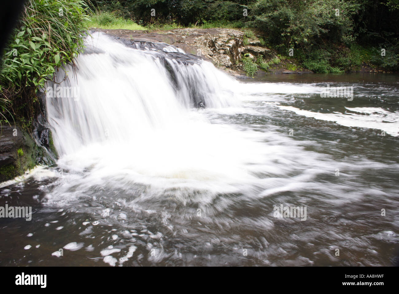 WATER FLOWING RAPIDLY DOWN A RIVER QUEENSLAND AUSTRALIA HORIZONTAL ...