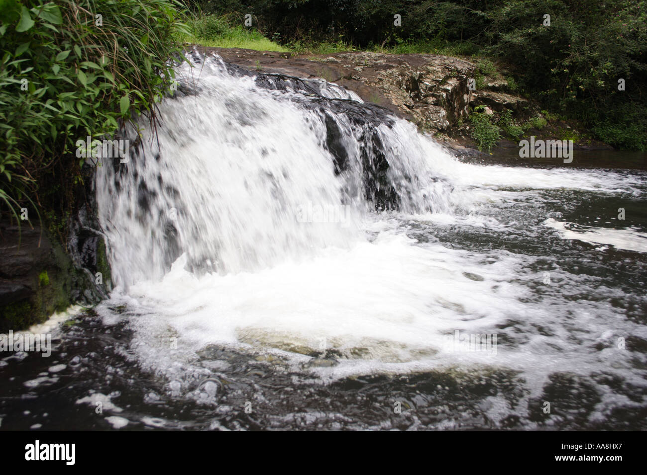 WATER FLOWING RAPIDLY DOWN A RIVER QUEENSLAND AUSTRALIA HORIZONTAL ...