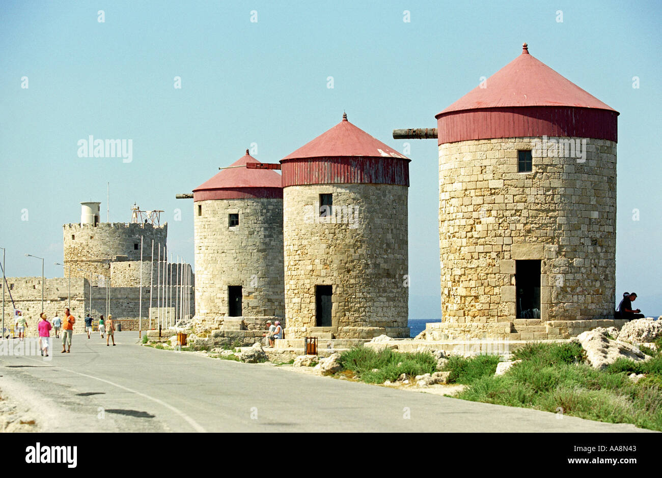 Traditional old stone windmills at Rhodes Town harbour Greek Islands ...